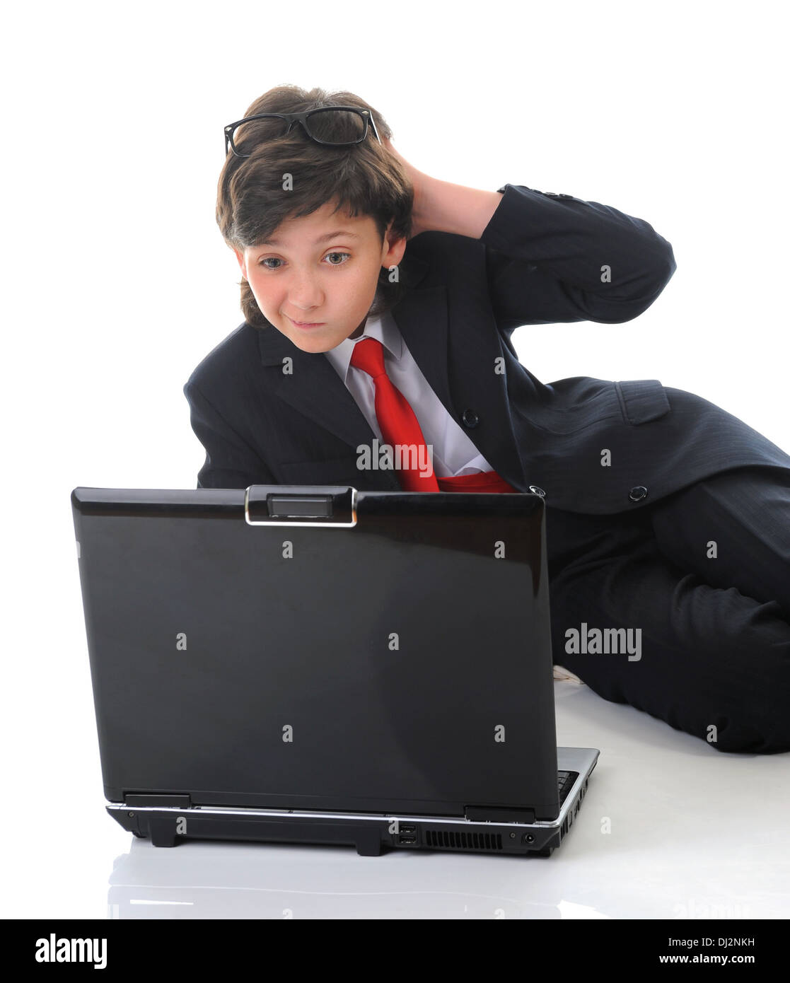 boy in business suit sitting in front of computer Stock Photo - Alamy