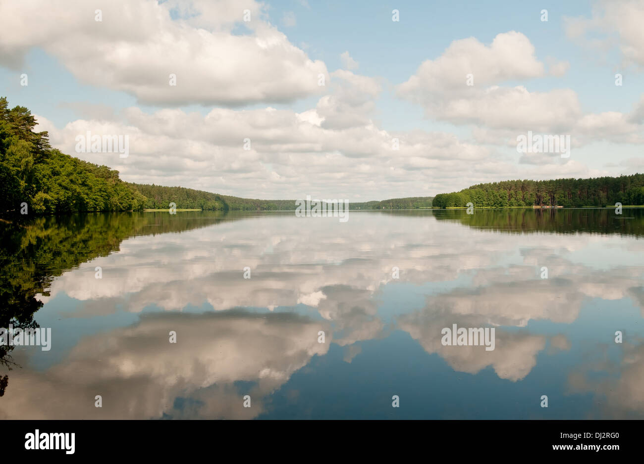 idyllic lake with clouds reflection Stock Photo - Alamy