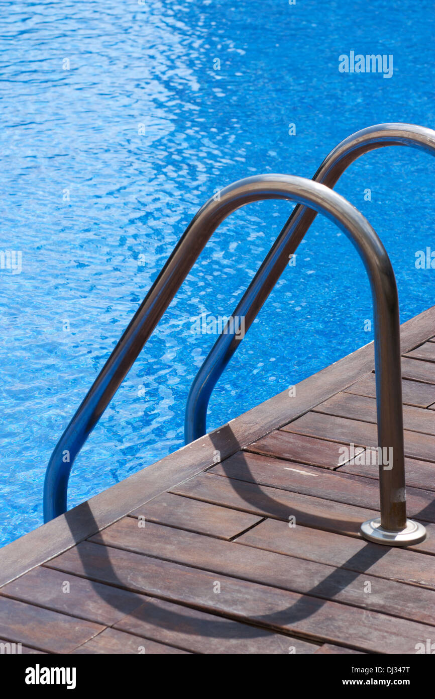 Ladder and handrail on the banks of a swimming pool Stock Photo - Alamy