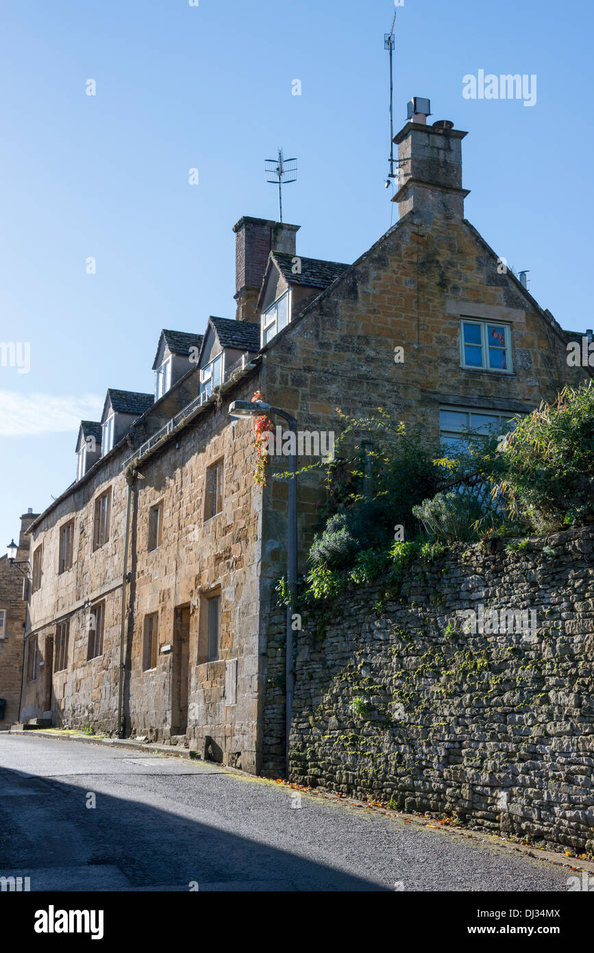 Pretty limestone houses and street in the village of Blockley The ...