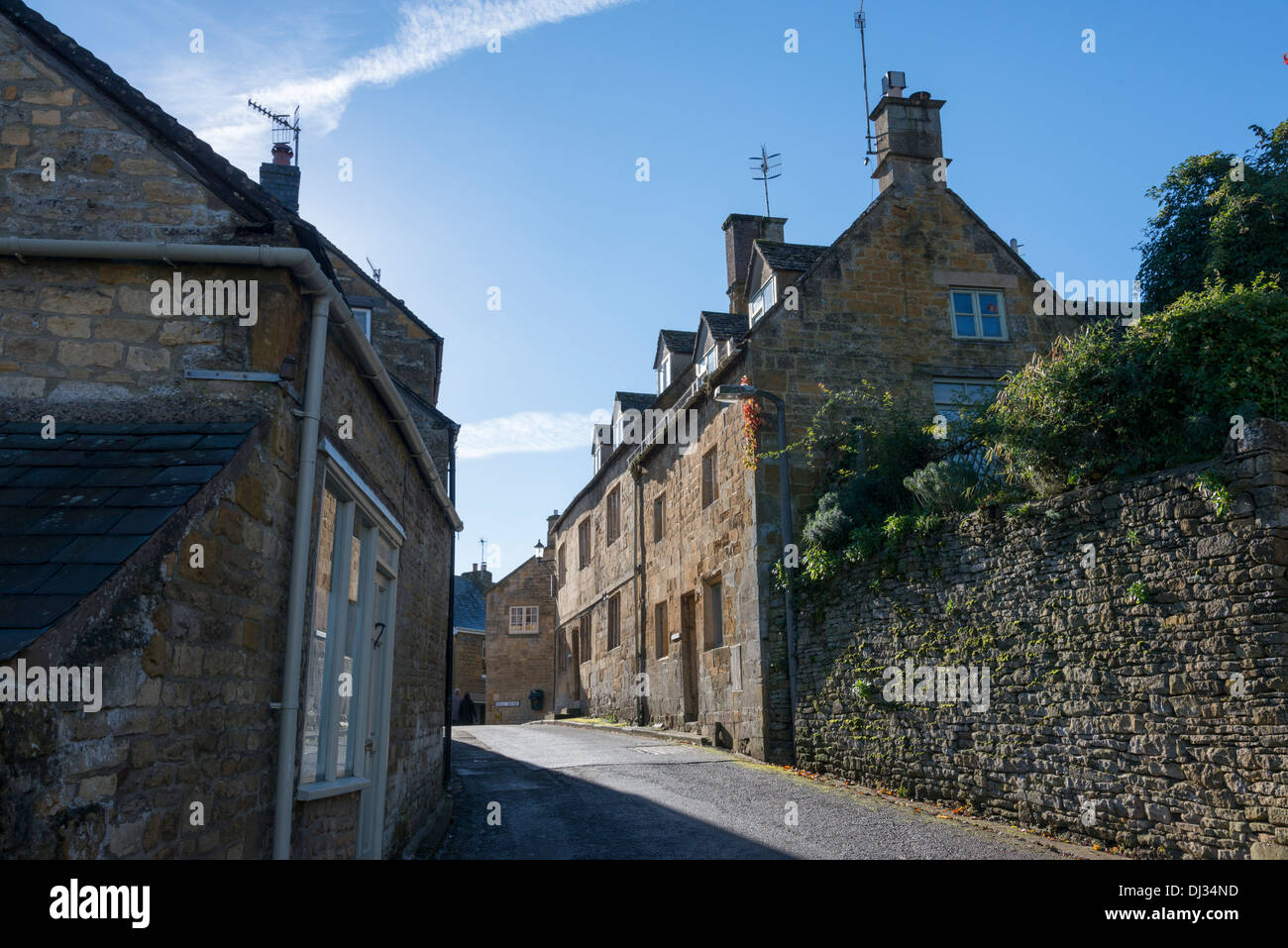 Pretty limestone houses and street in the village of Blockley The ...