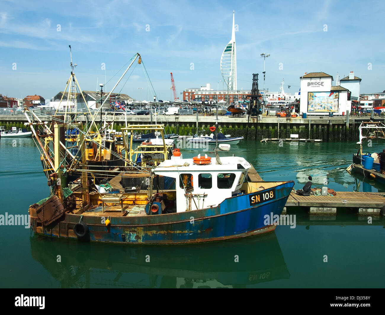 A trawler and boats at Camber Docks, Portsmouth, England Stock Photo ...