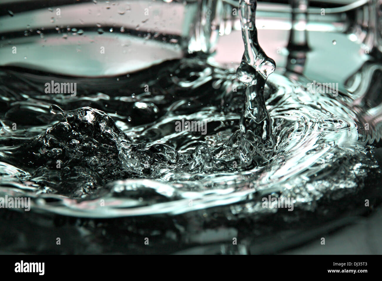 Closeup Pictures Pour water into the basin and see water droplets is ...