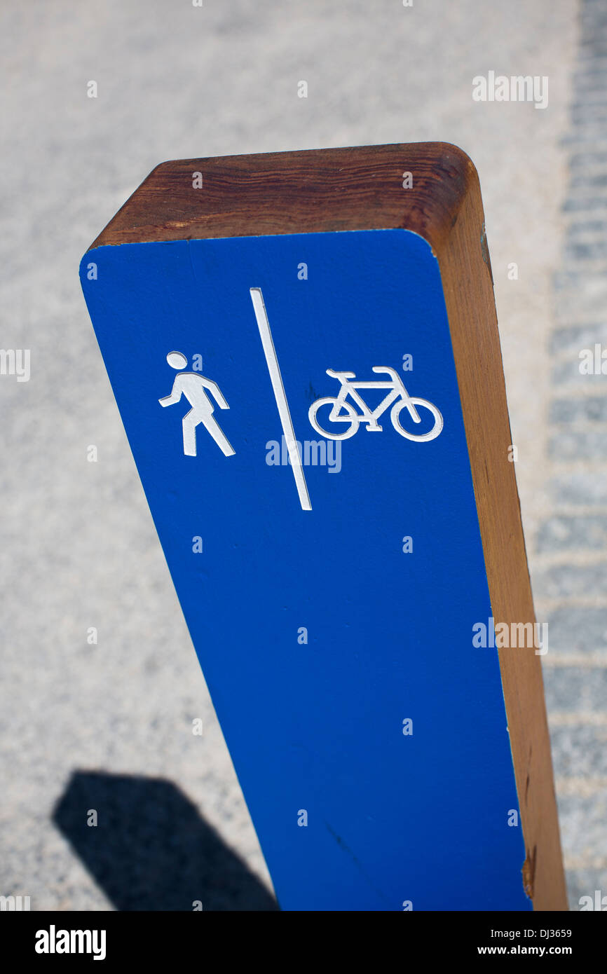 Blue signpost indicating cycle lane and walk way in Brooklyn, New York ...