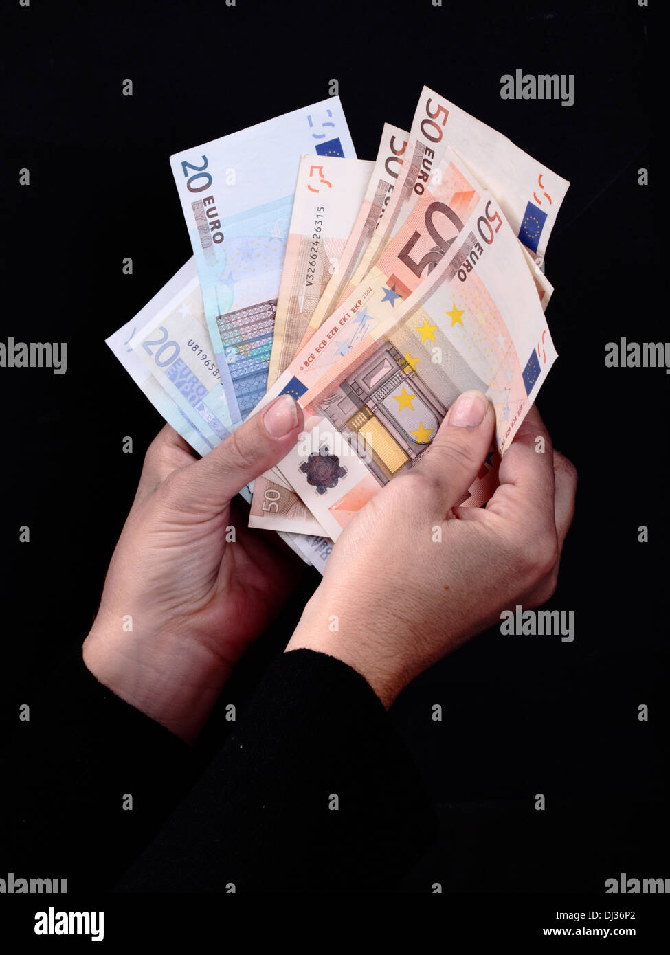 Hands grabbing cash hi-res stock photography and images - Alamy