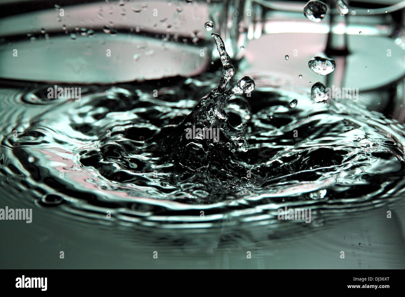 Closeup Pictures Pour water into the basin and see water droplets is ...