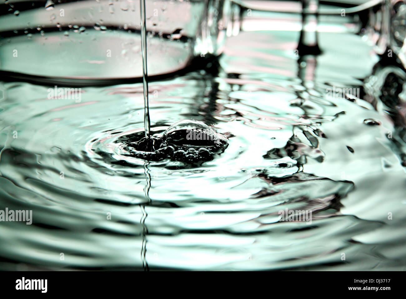 Closeup Pictures Pour water into the basin and see water droplets is ...
