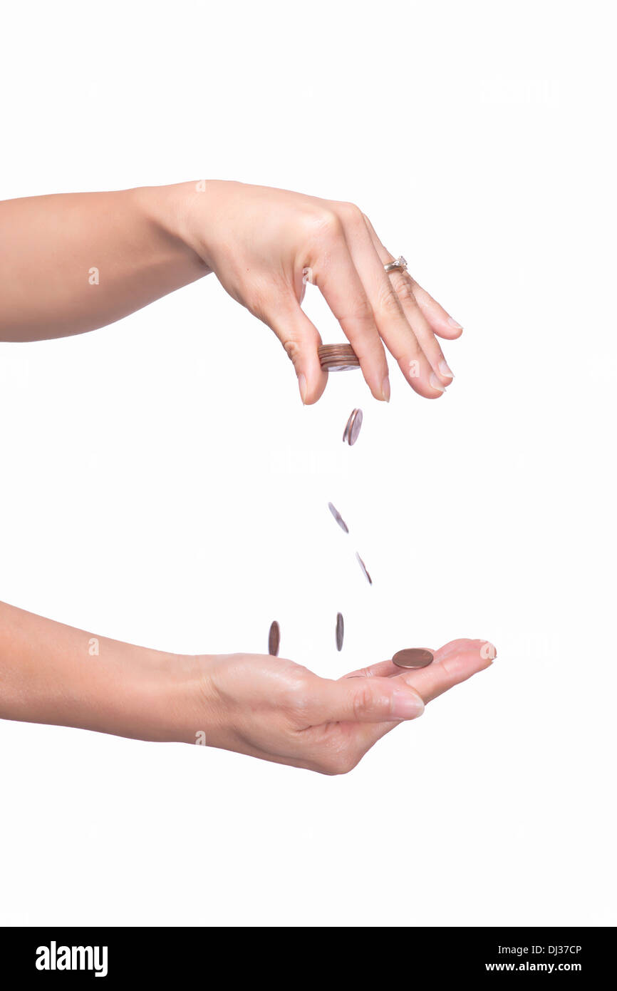 Hand dropping money hi-res stock photography and images - Alamy
