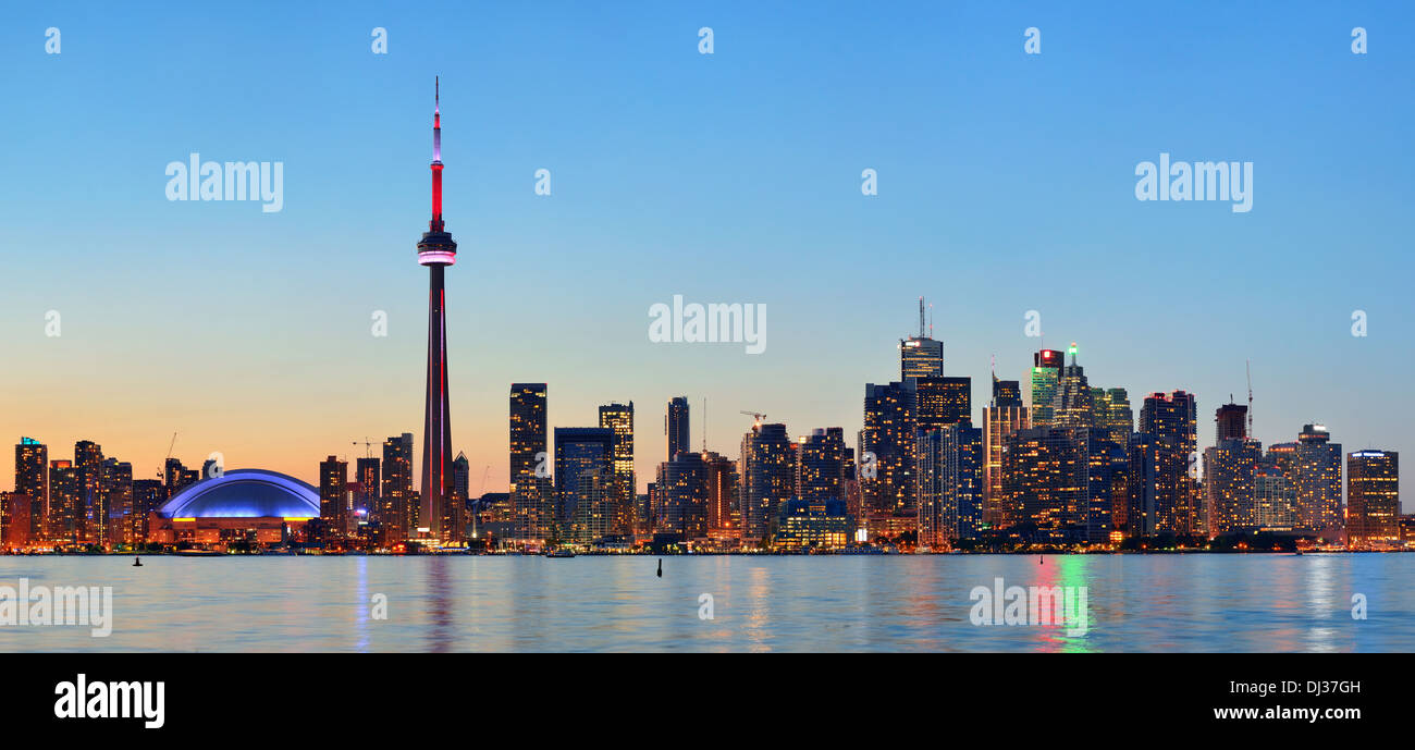 Toronto sunset over lake panorama with urban skyline Stock Photo - Alamy