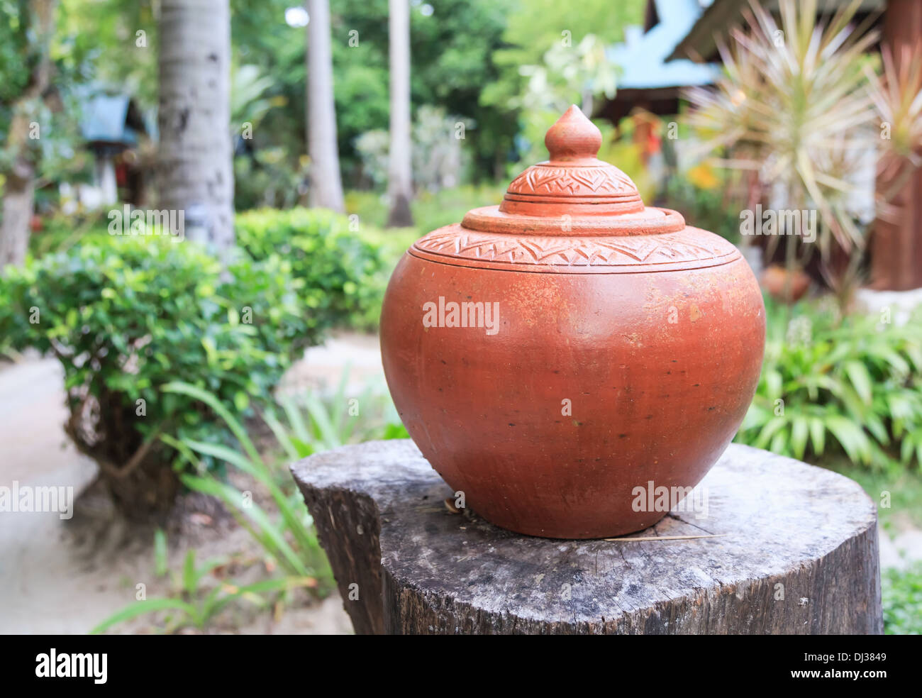 Thai water earthen jar in the resort Stock Photo - Alamy