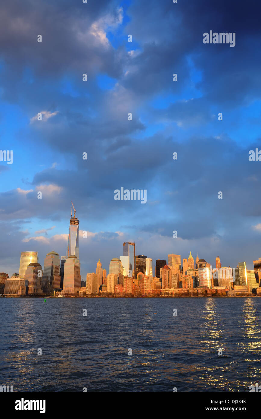 Downtown Manhattan skyline at sunset over Hudson River in New York City Stock Photo - Alamy