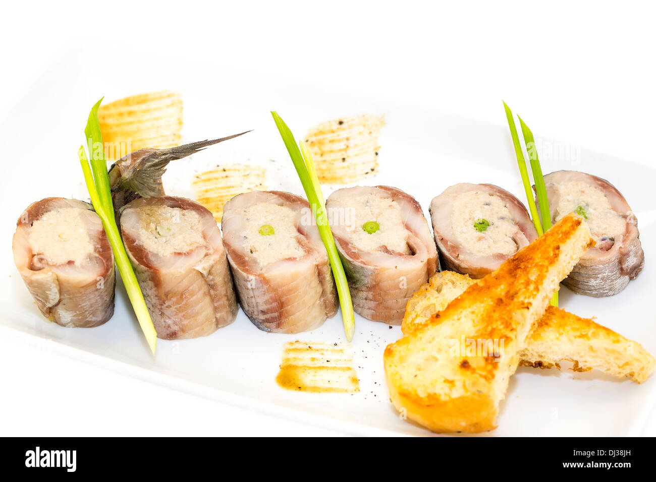 appetizer of herring stuffing on a table in a restaurant Stock Photo ...