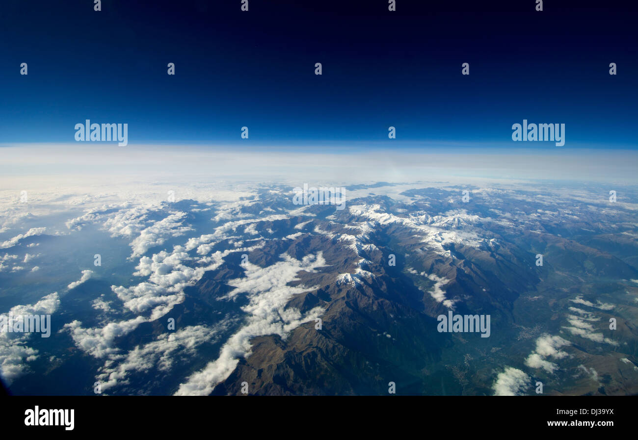 Unusual aerial view of sky and clouds over the earth. Suitable as ...
