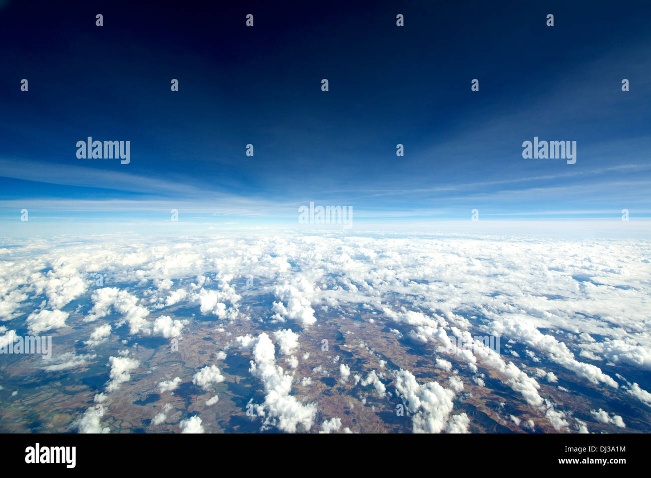 Unusual aerial view of sky and clouds over the earth. Suitable as ...