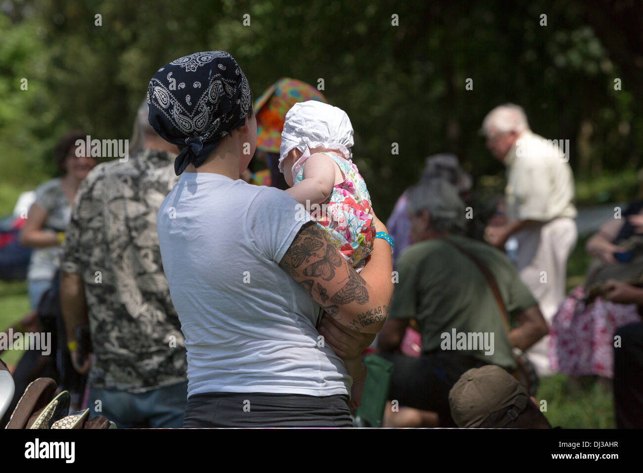 Tattoo moder and child in the Pete Seeger at the Solar Expo Jam folk ...