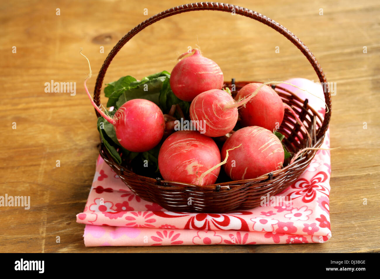 Garden red radish on wooden table hi-res stock photography and images ...