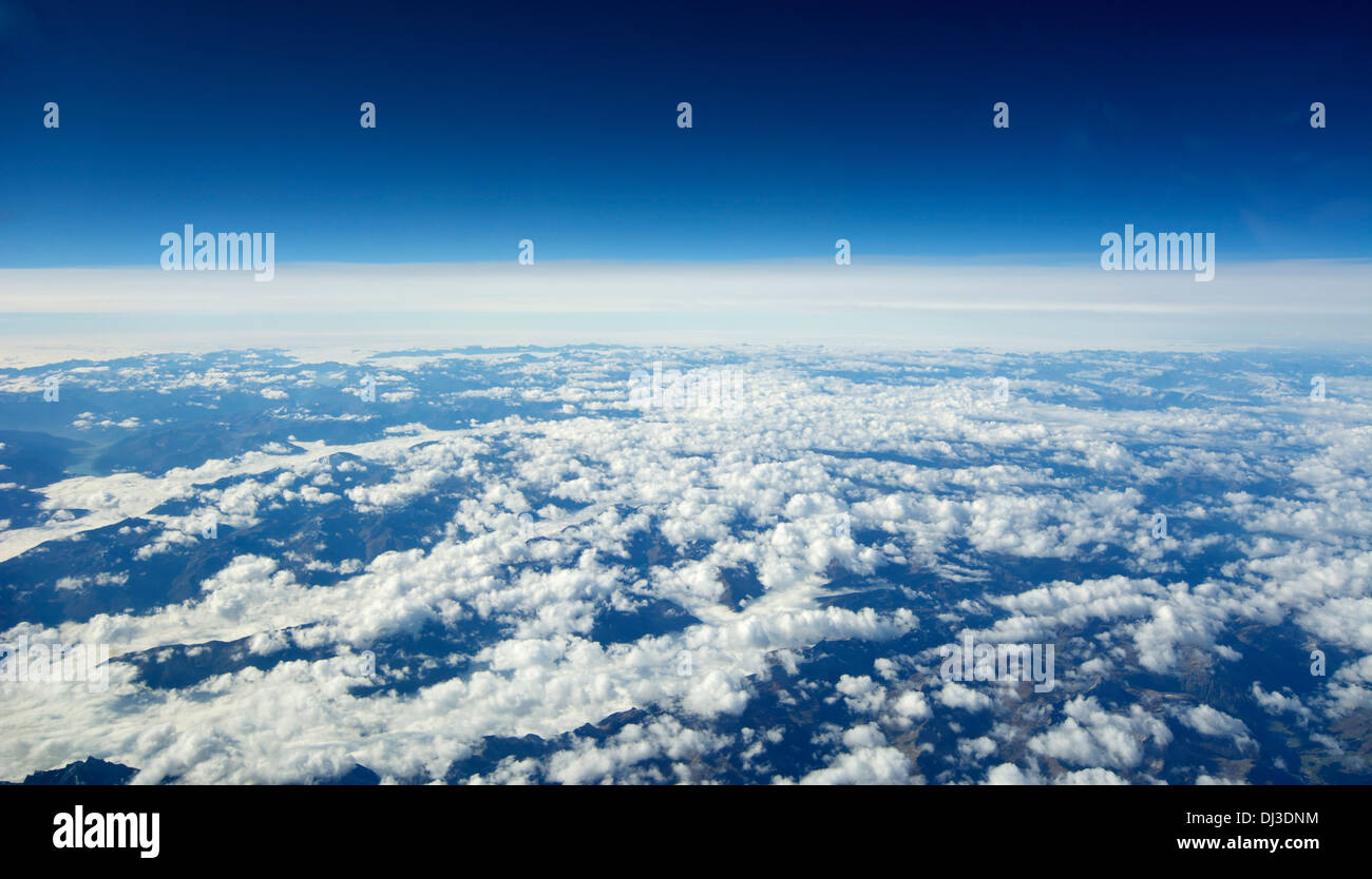 Unusual aerial view of sky and clouds over the earth. Suitable as ...