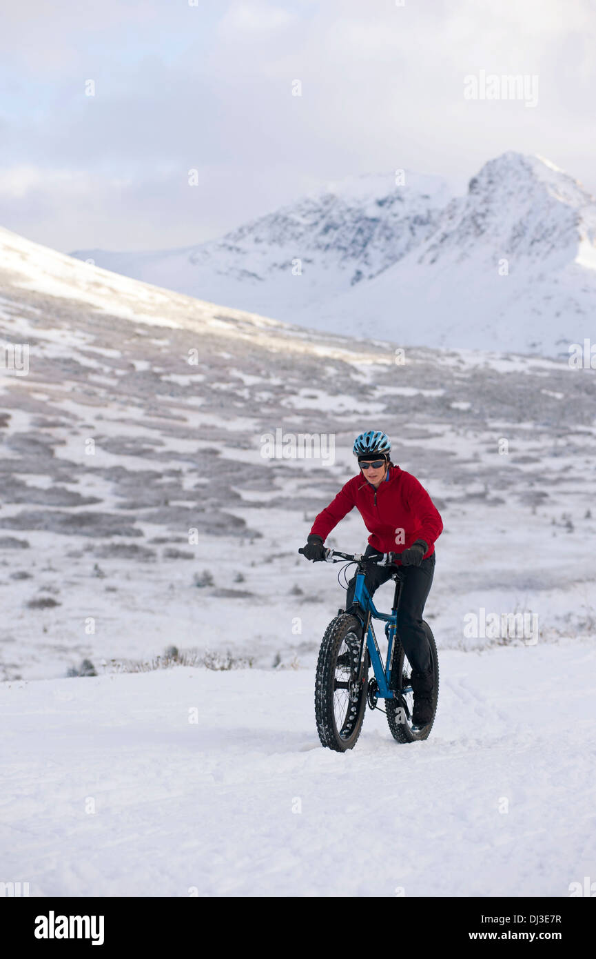 Woman Riding A Fat Tire Fatback Snow Bike In Winter, Glen Alps Area ...