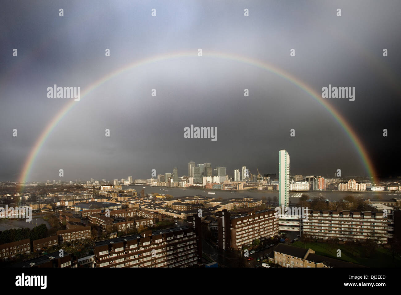 UK Weather: Colourful rainbow breaks during a brief rainstorm over ...