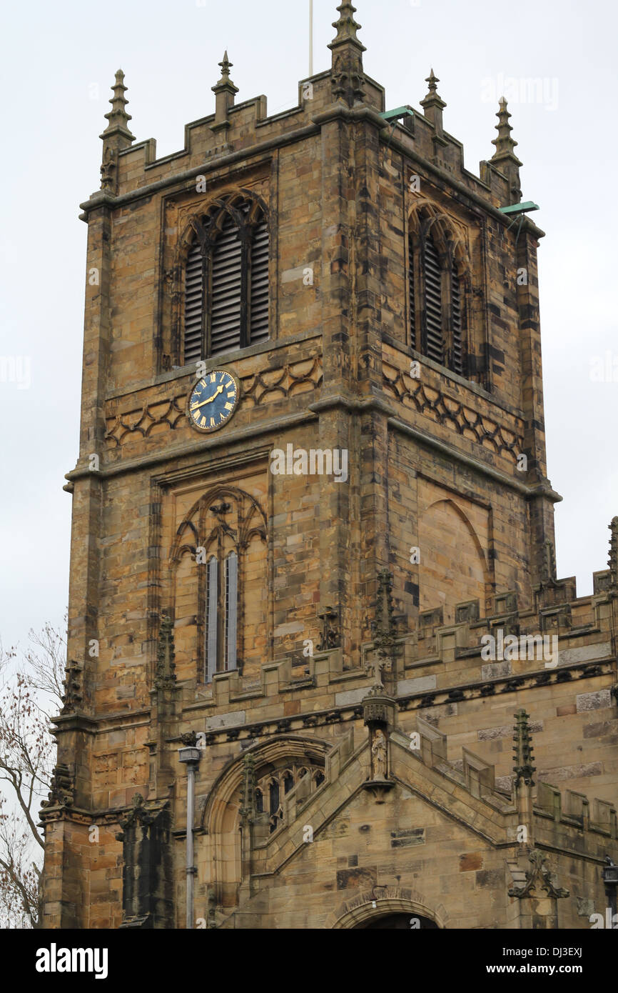 St. Marys Parish Church, Mold, Wales, UK. A medieval church clock tower ...