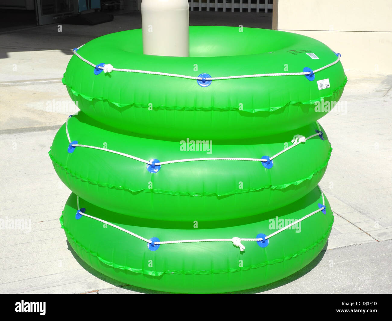 The three green water tubes form a pleasing pattern Stock Photo - Alamy