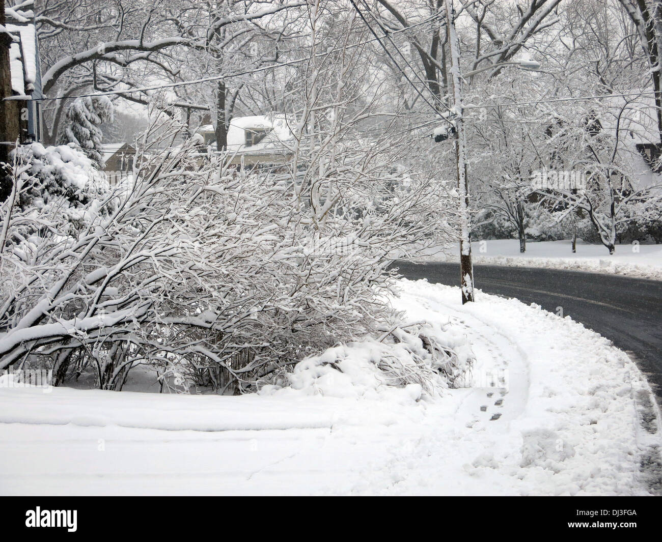 Snowy Suburban Street Corner Stock Photo - Alamy