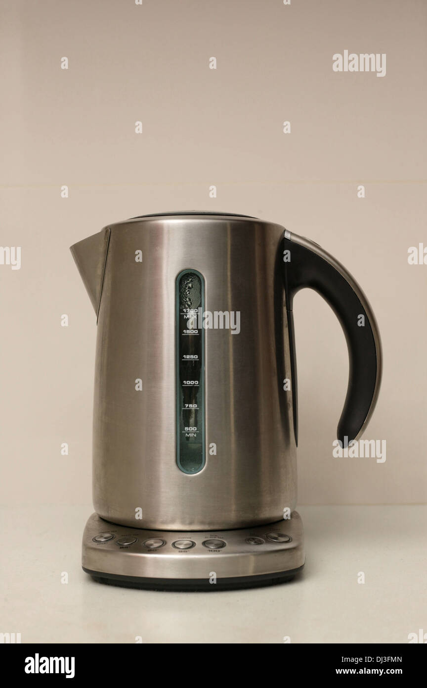 An electric kittle isolated on a kitchen bench Stock Photo - Alamy