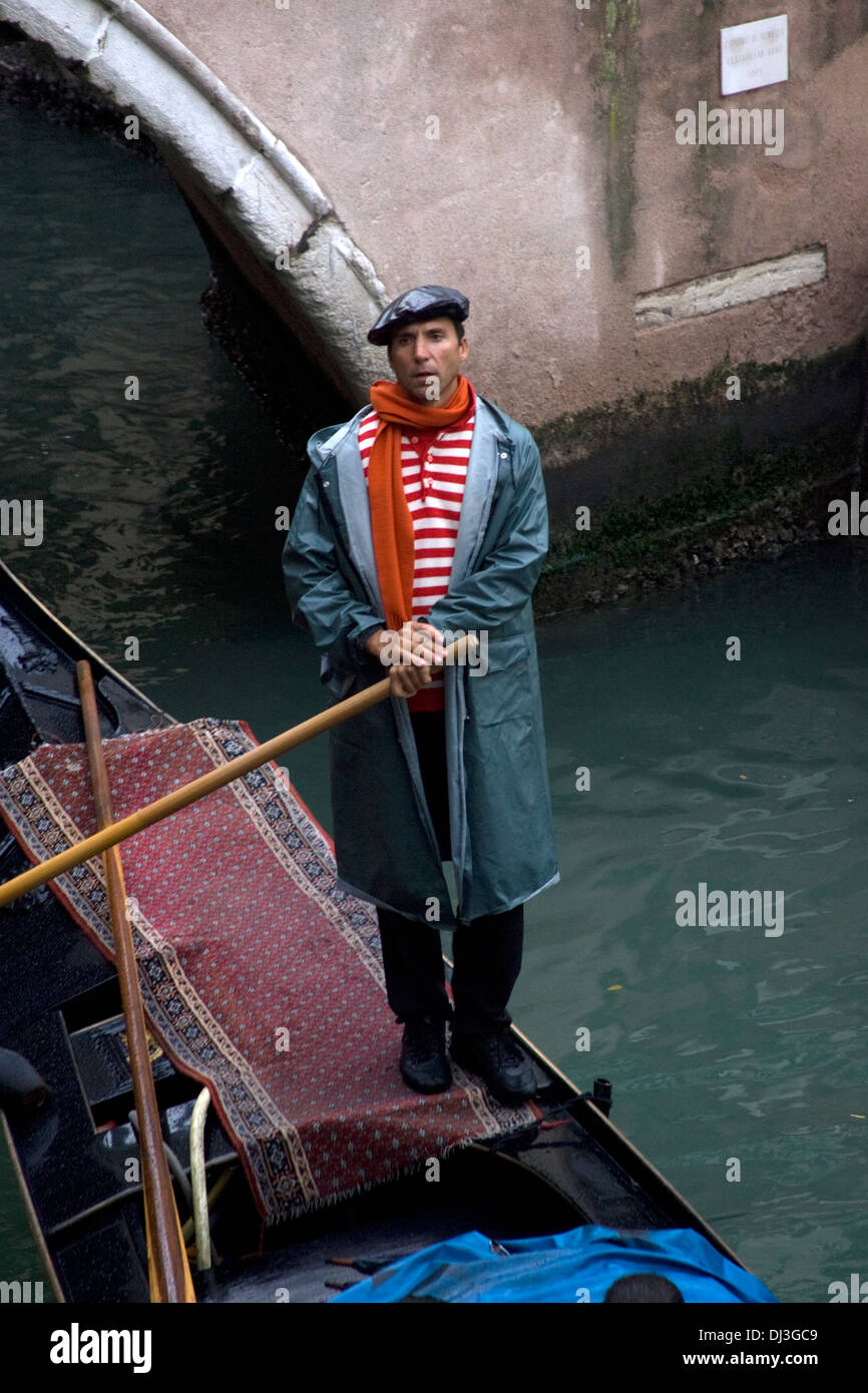 A gondolier on his gondola, Venice Stock Photo - Alamy