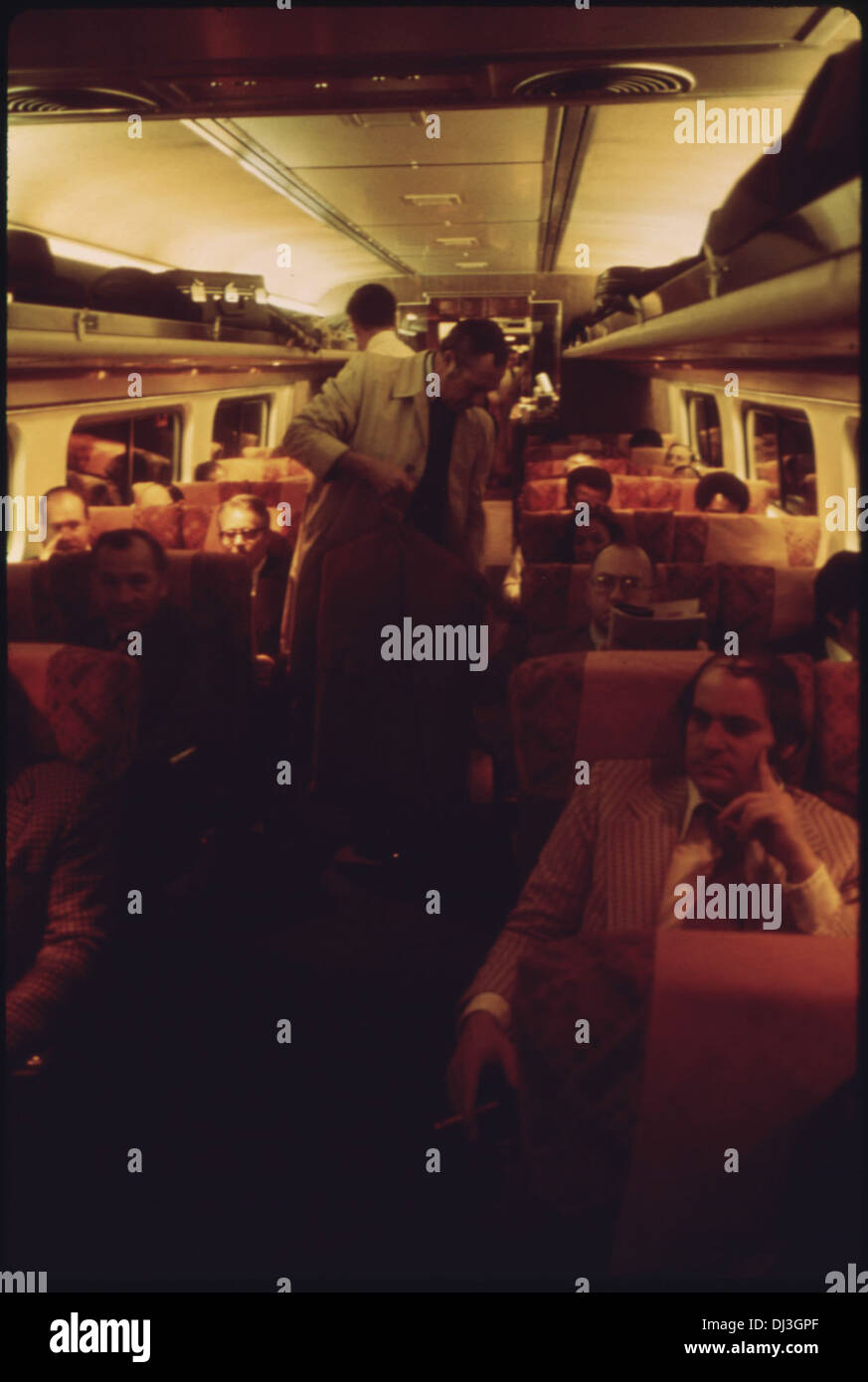 Passengers travel aboard a Metroliner train from Washington, D.C. to ...