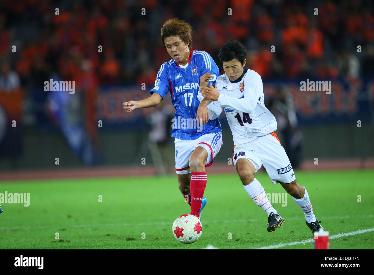 Nissan Stadium, Kanagawa, Japan. 20th Nov, 2013. (L to R) Jin Hanato (F Marinos), Kohei Takano ...