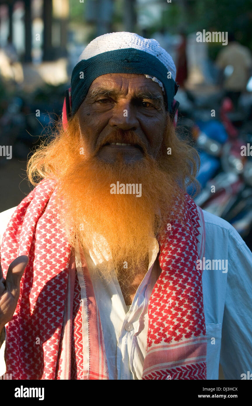 Indian Muslim pilgrim at Sri Ramana Ashram with traditional henna beard ...