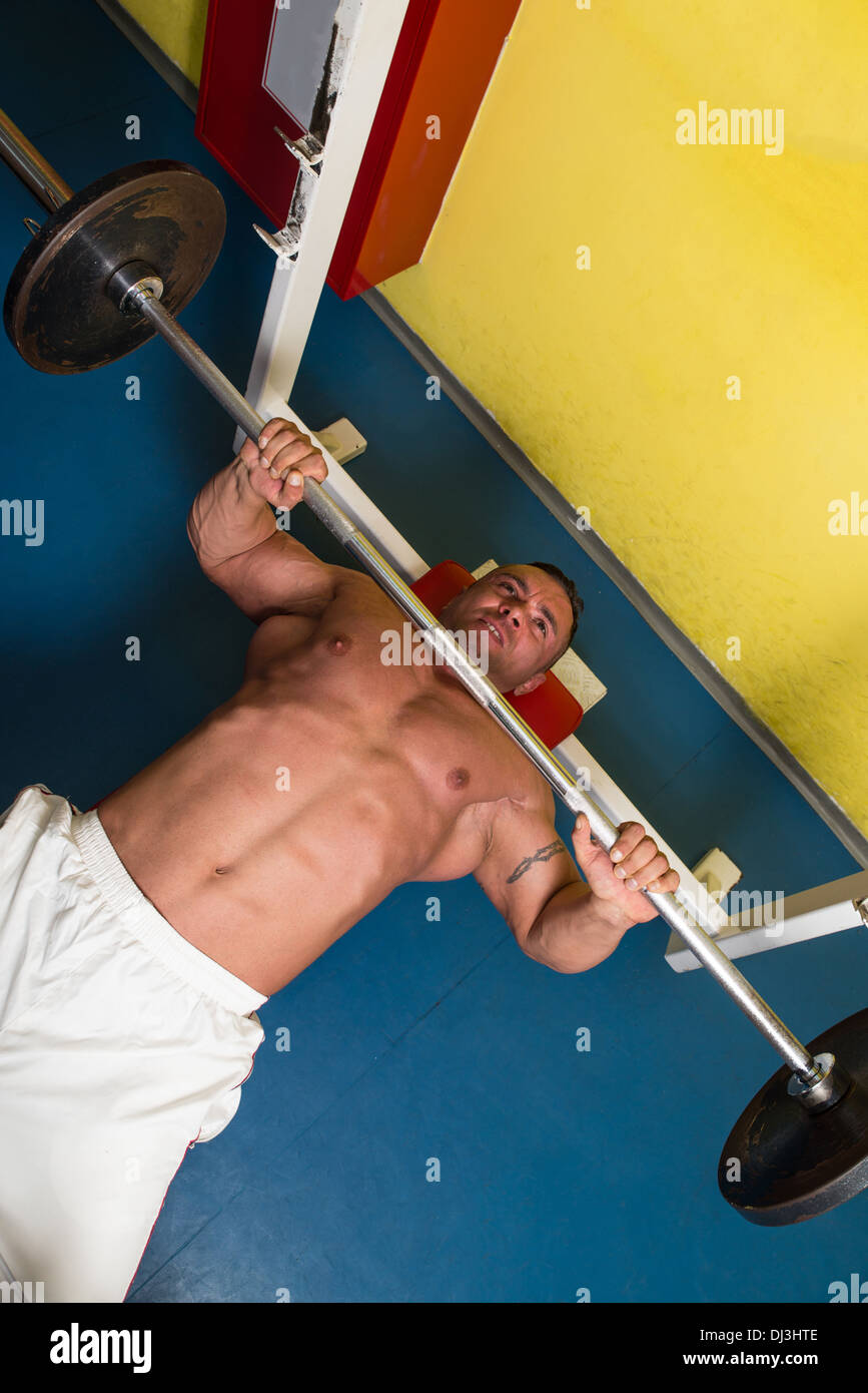 Man gym showing off muscle hi-res stock photography and images - Alamy