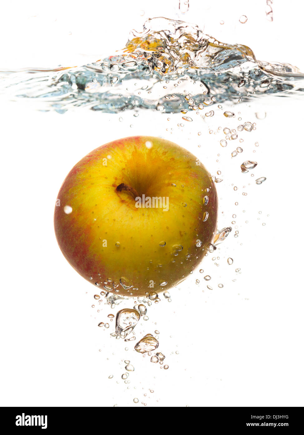 Red yellow apple in the water splash over white background. Healthy ...
