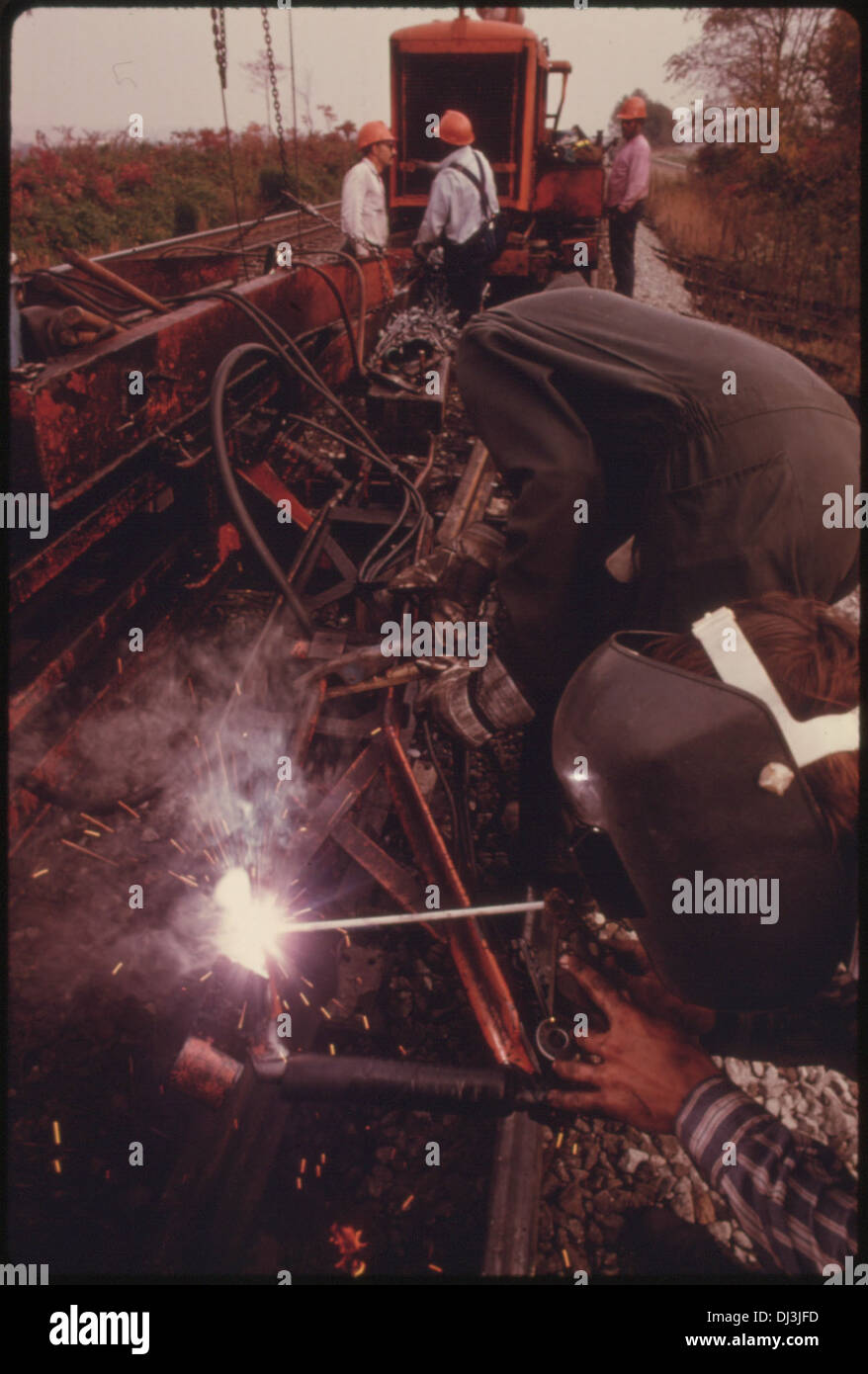 Southern Railway track repair crew using specialized equipment to lay ...