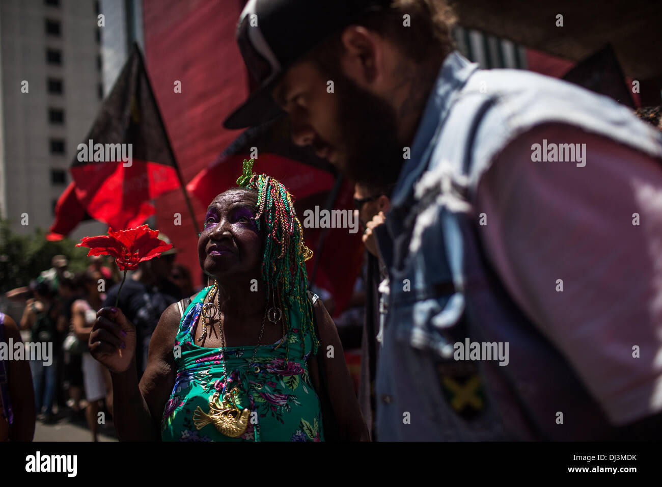 Sao Paulo, Brazil. 20th Nov, 2013. Demonstrators take part in a parade ...