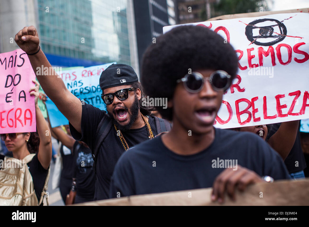Sao Paulo, Brazil. 20th Nov, 2013. Demonstrators take part in a parade ...