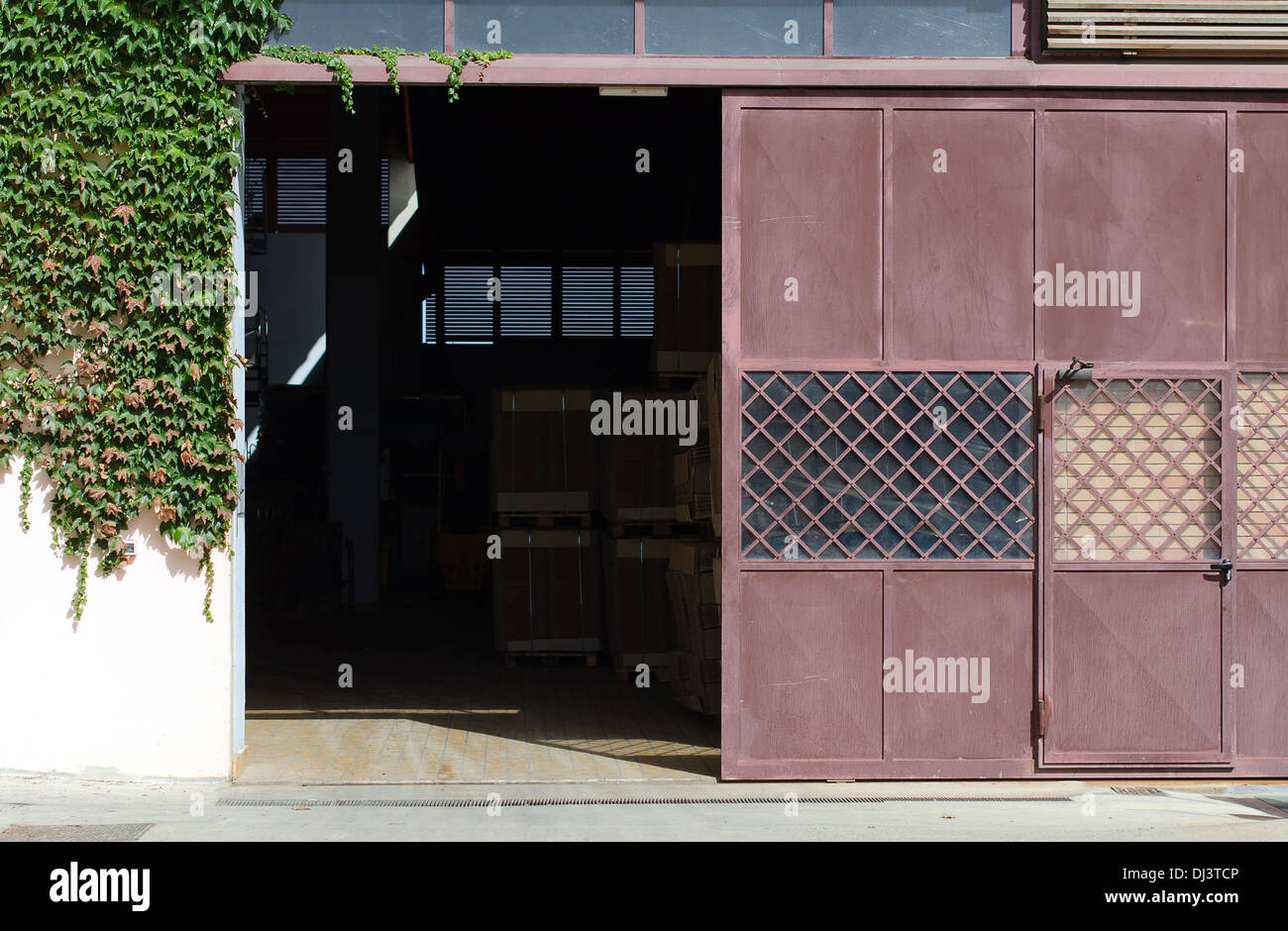 Door entrance in warehouse storage Stock Photo - Alamy
