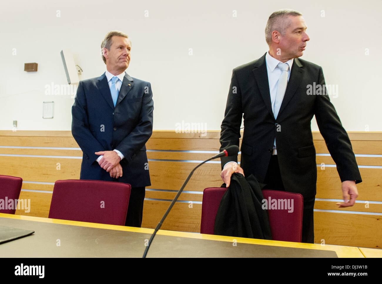 Former German President Christian Wulff (L) and his lawyer Bernd ...