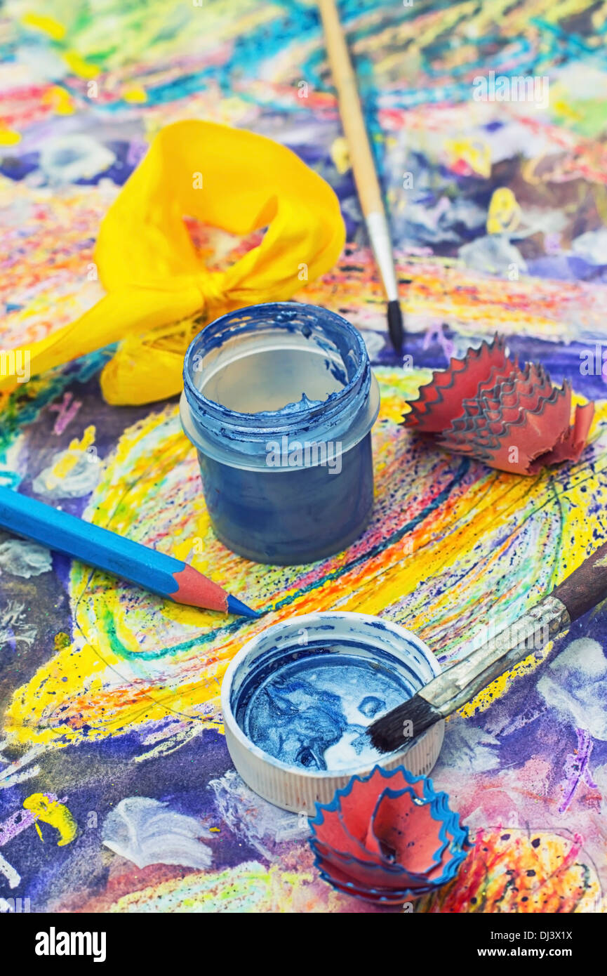 pencils,paint in different colors on the color palette Stock Photo - Alamy