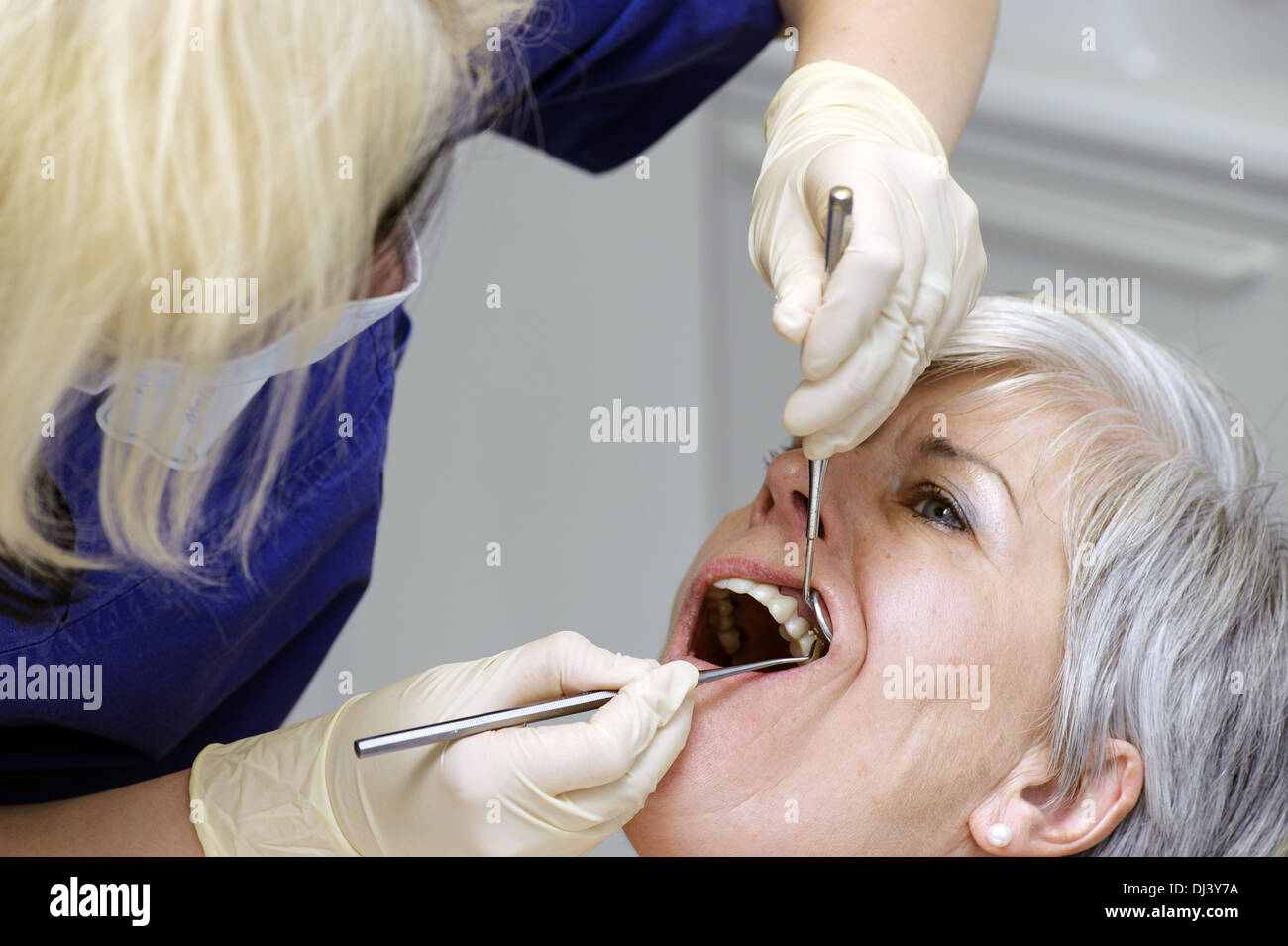 Control of the teeth by a dental assistant Stock Photo - Alamy