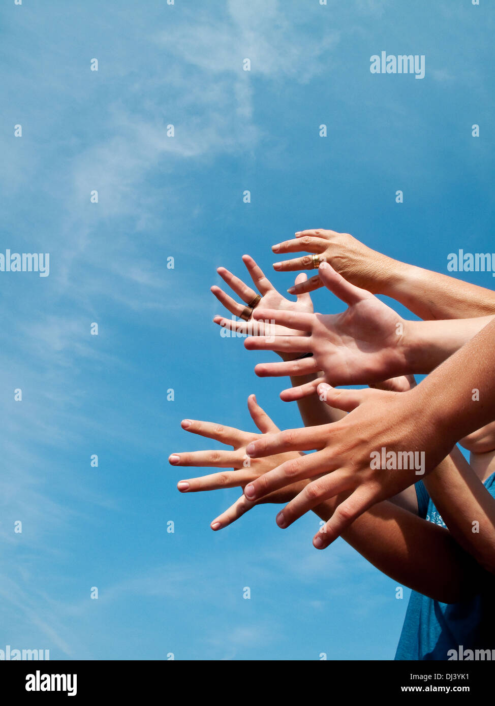 Hands reaching to sky hi-res stock photography and images - Alamy