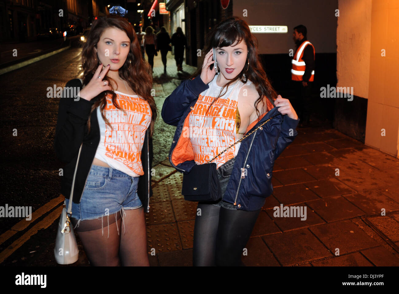 Two young female University students in Brighton enjoy the Carnage UK ...