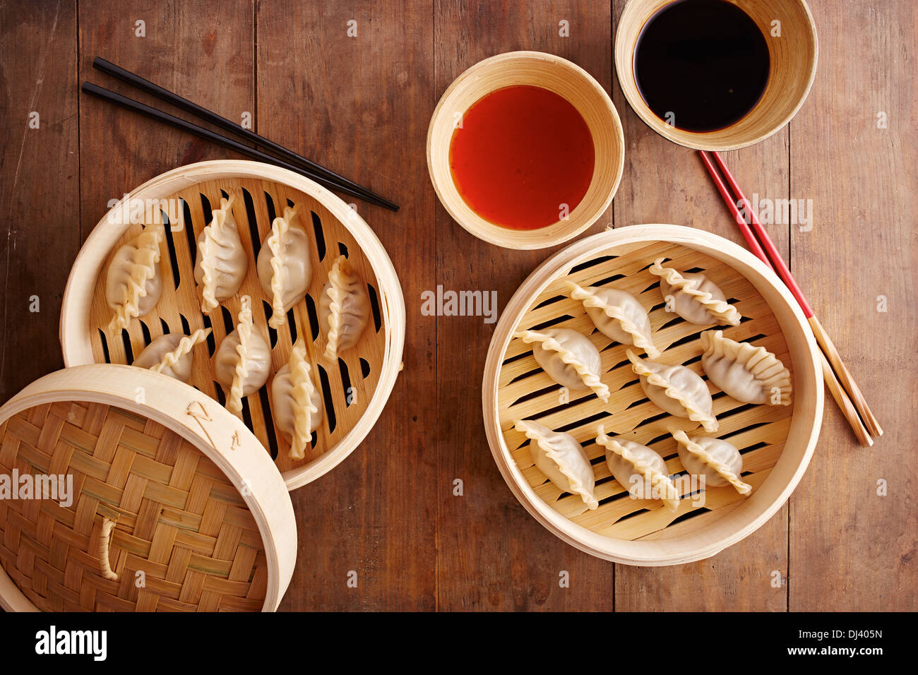 Homemade dim-sum asian dumplings on a traditional bamboo steamer Stock ...