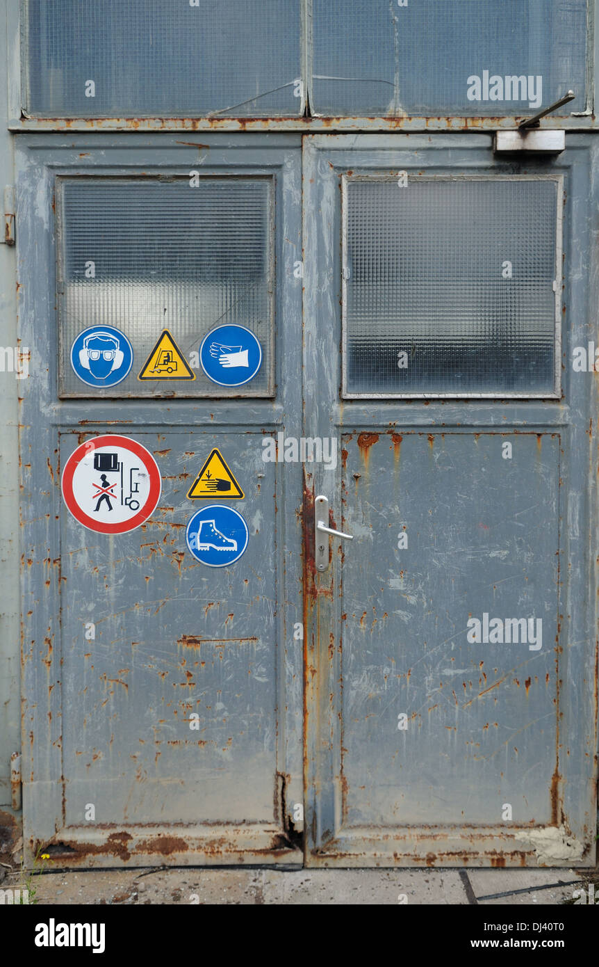 Warning signs on the door Stock Photo - Alamy