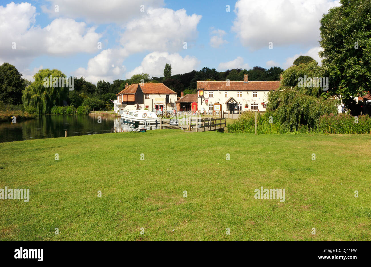 A view of the River Bure and the Rising Sun Inn on the Norfolk Broads ...