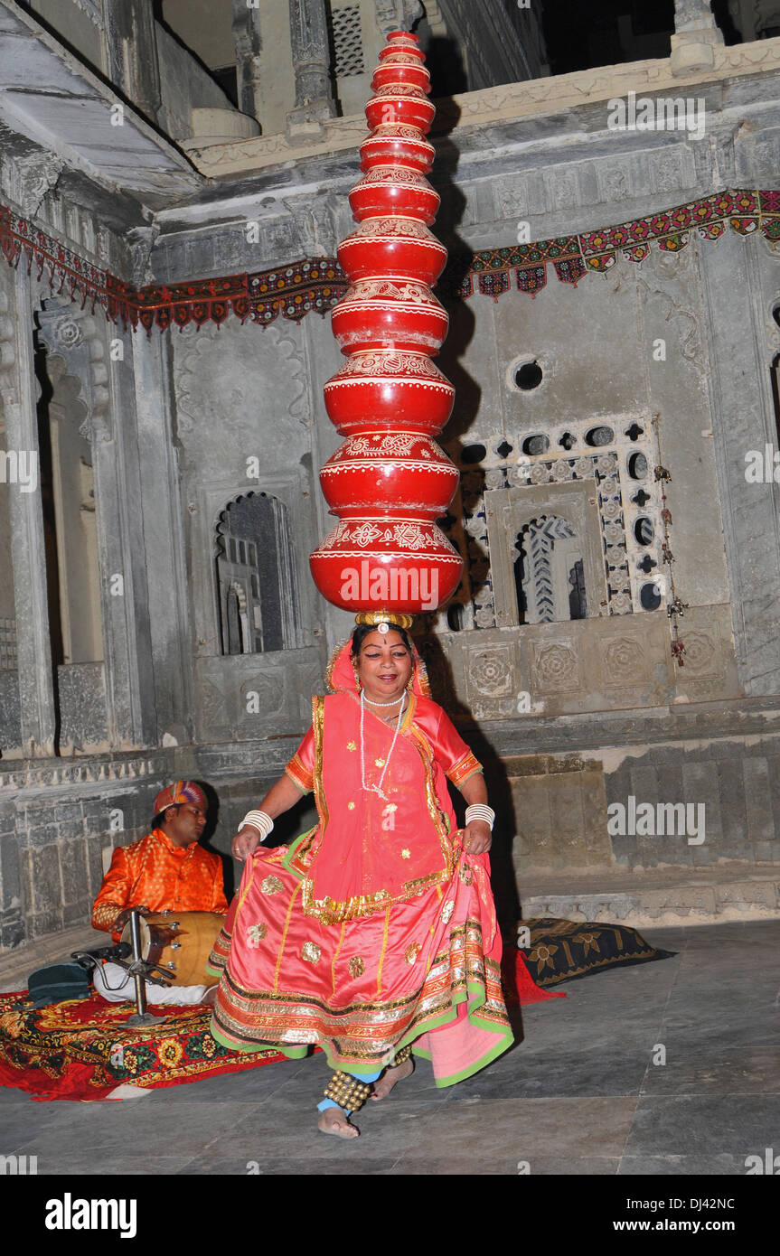 Bhavai dance. Female performers balance earthen pots or brass pitchers ...