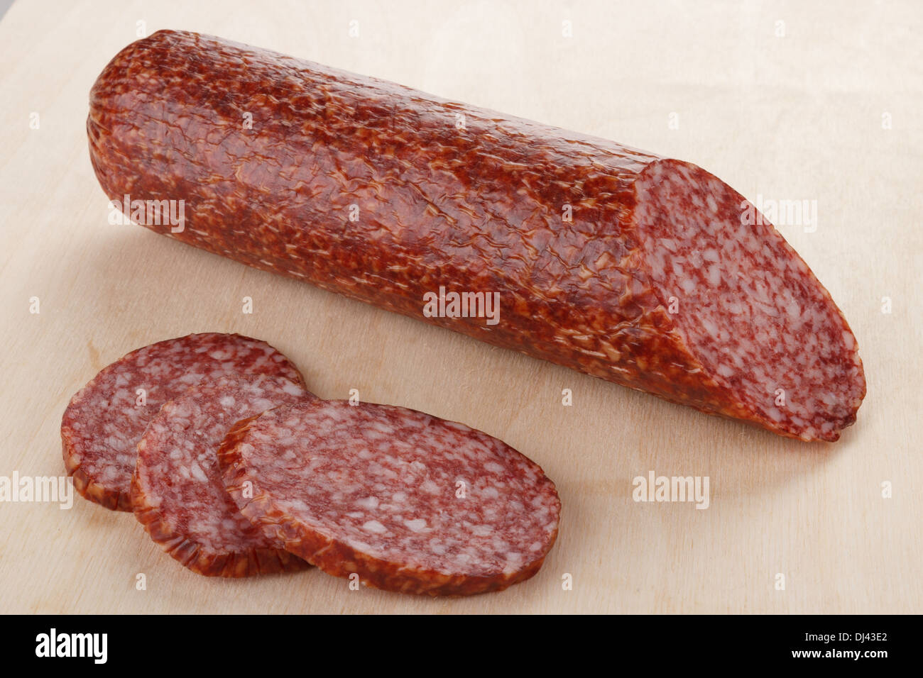 Salami on chopping board hi-res stock photography and images - Alamy