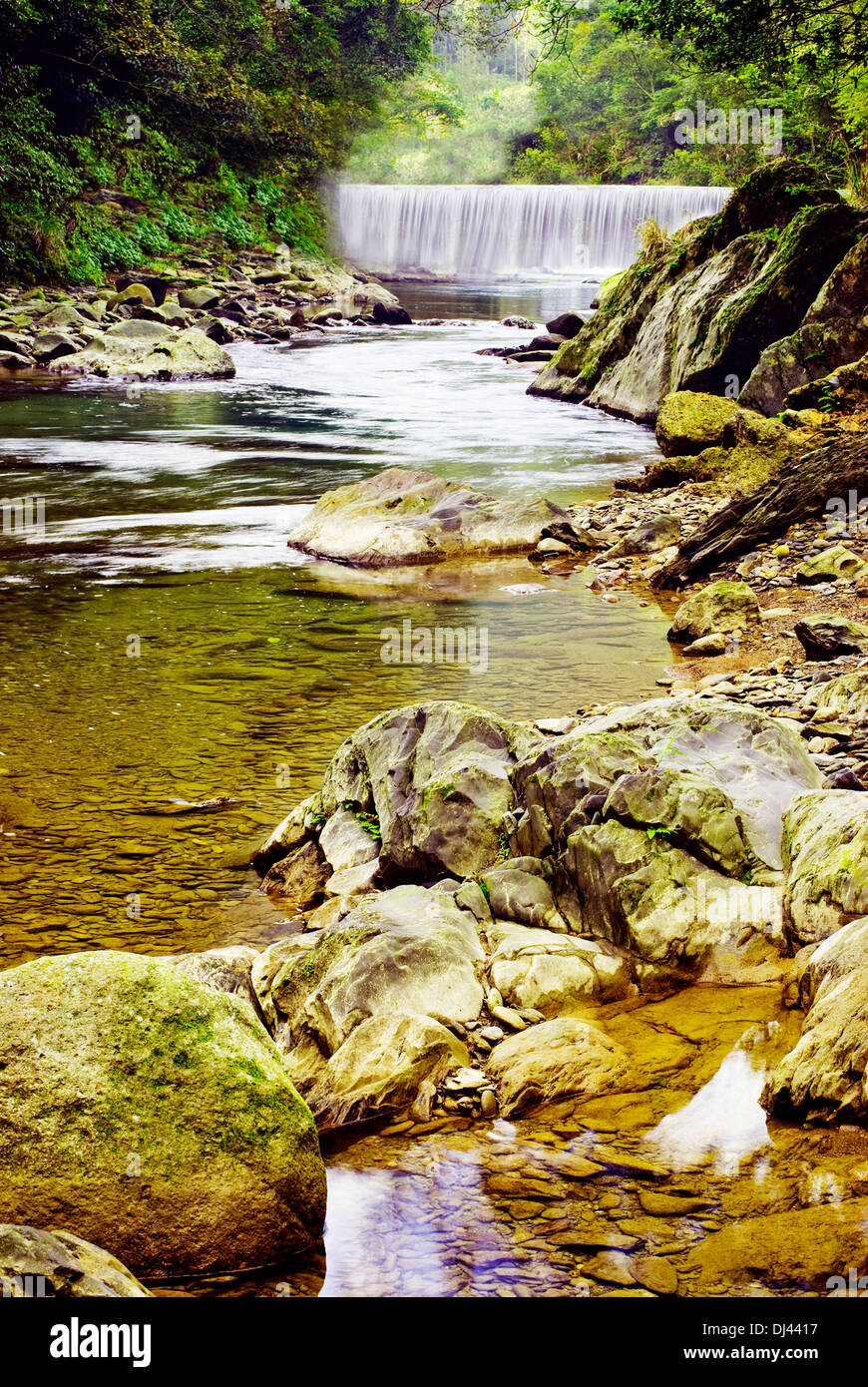 Small river with waterfall and rocks Stock Photo - Alamy