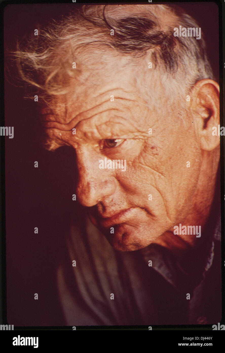 A uranium miner operates equipment in a mining operation, extracting ...