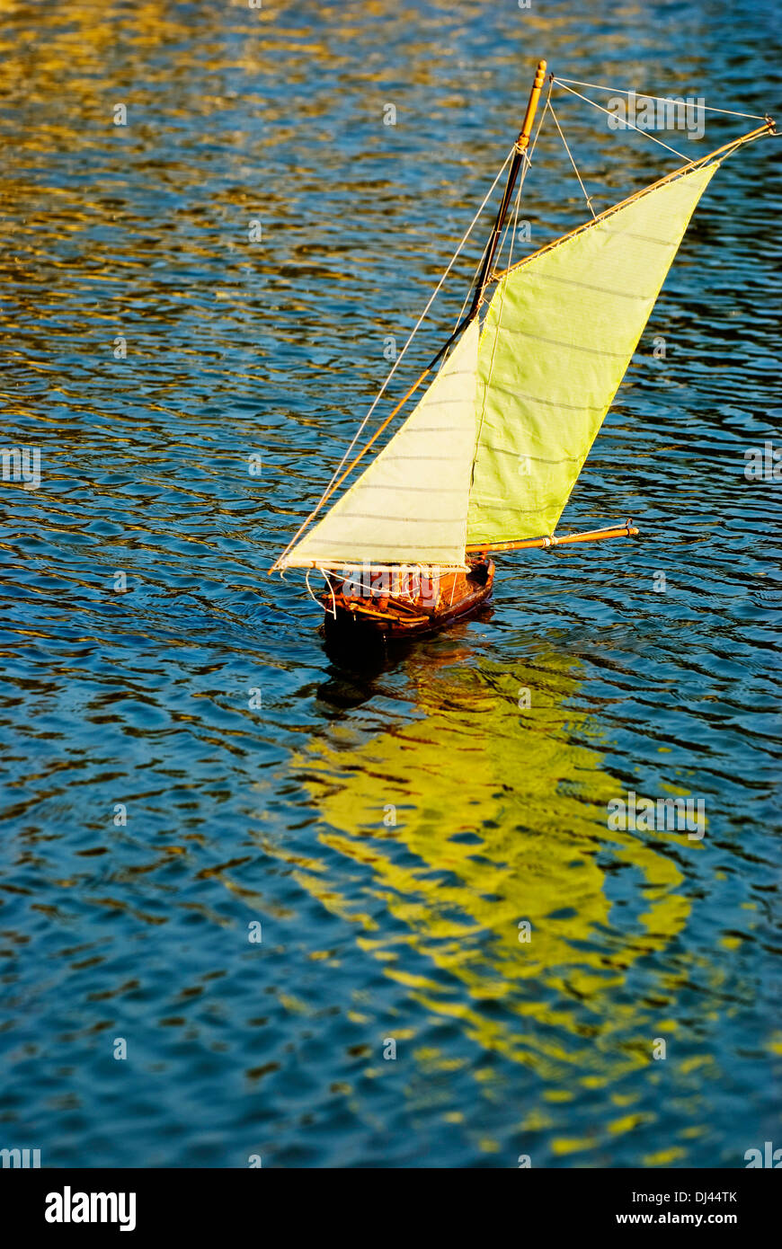 Handmade remote control sailboat on lake Stock Photo - Alamy
